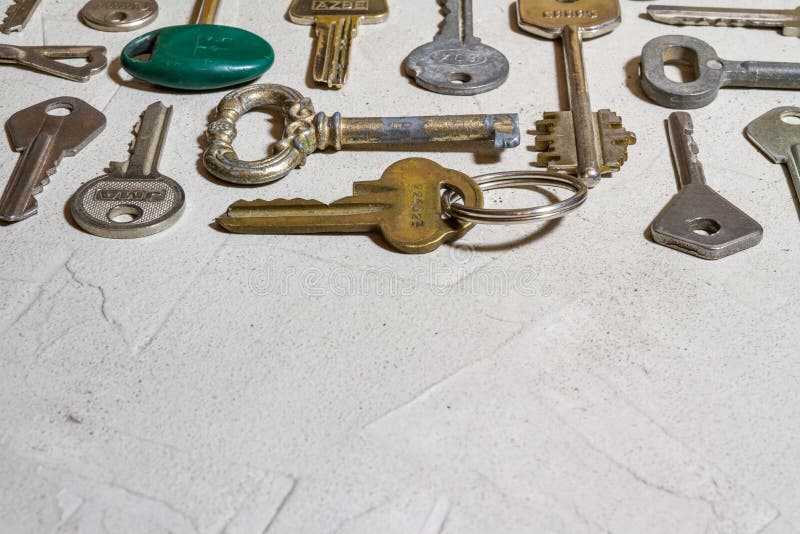 Background from of Various Keys on Rough Concrete Surface Close-up ...