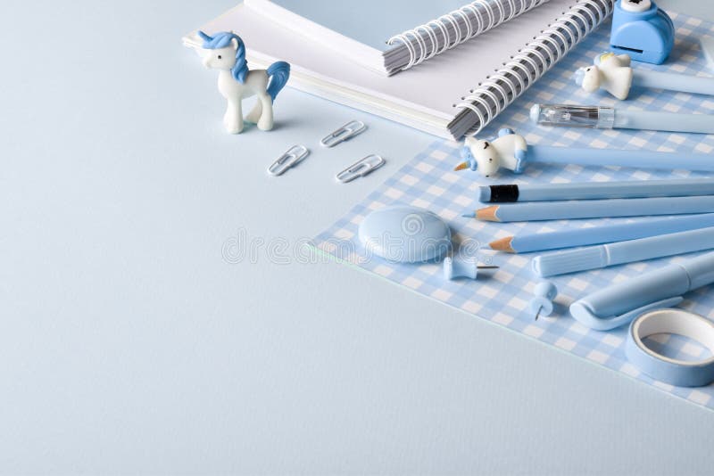 Background with Various Light Blue Stationery Lying on the Side on a ...
