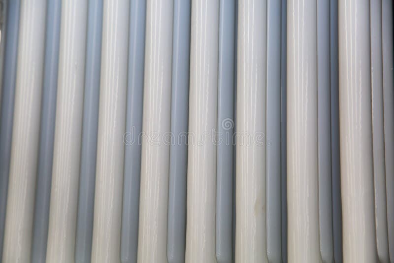 Background of Vertical Plastic Pipes in White. Design Backgrounds ...