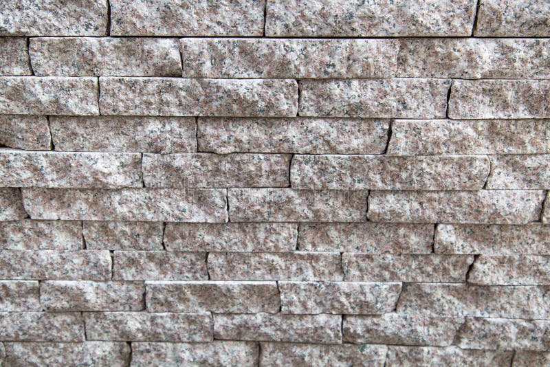 The Background of the Wall is Made of Strips of Natural Granite Rosa ...