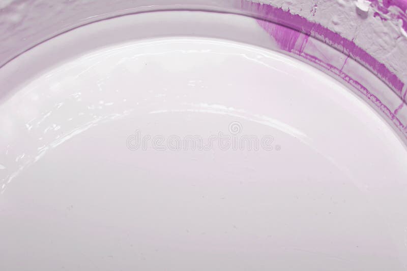 Background of White Paint in a Purple Container Close Stock Photo ...