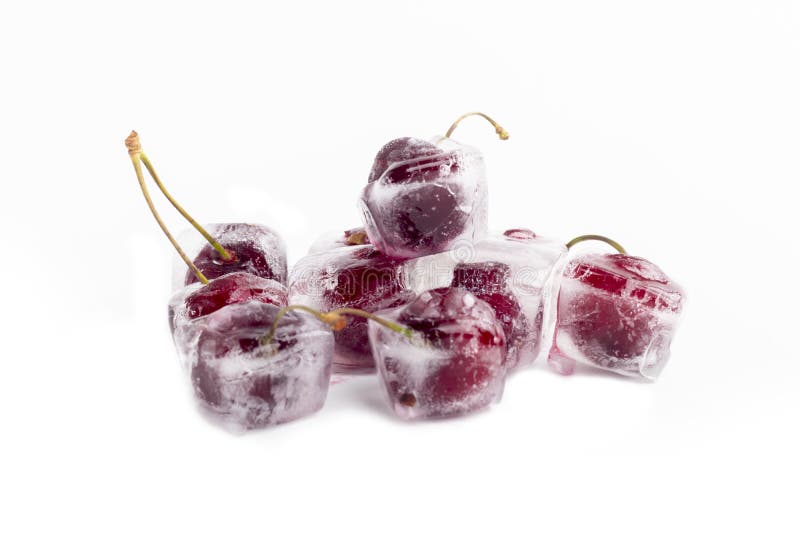 The Background is White. Red Cherries in Ice Cubes. Close-up Stock ...