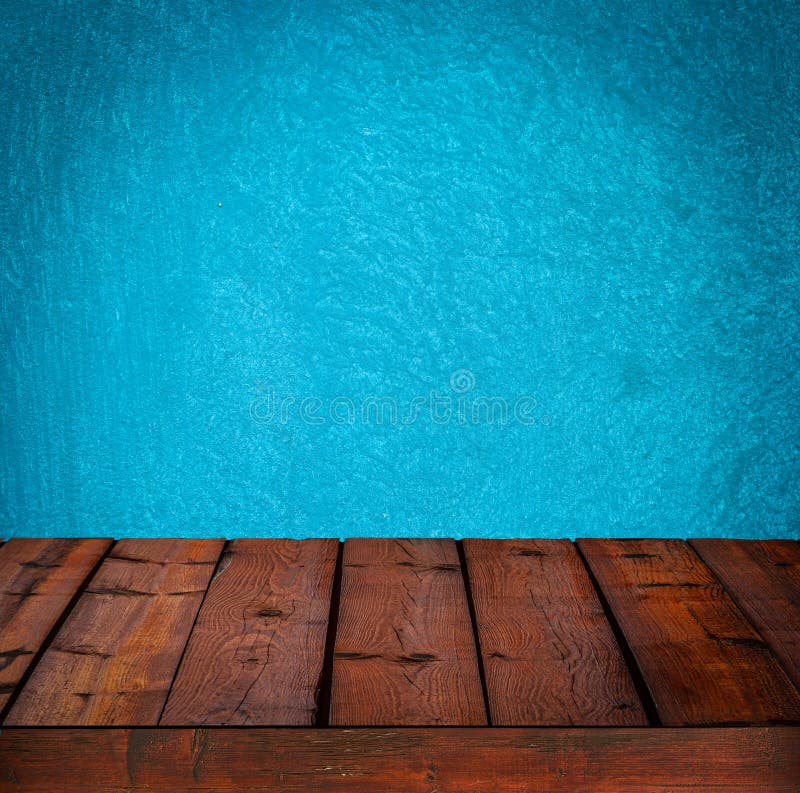 Background with Wooden Table and Grunge Blue Wall Stock Image - Image ...