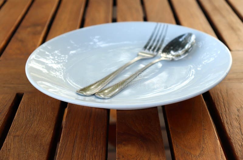 WOODEN TEXTURE Tableware on the Table Plate Knife and Fork Stock Image ...