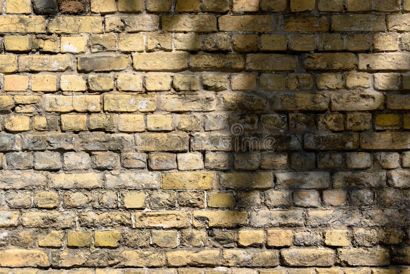 High Resolution Texture of a Yellow Brick Wall Background in the ...