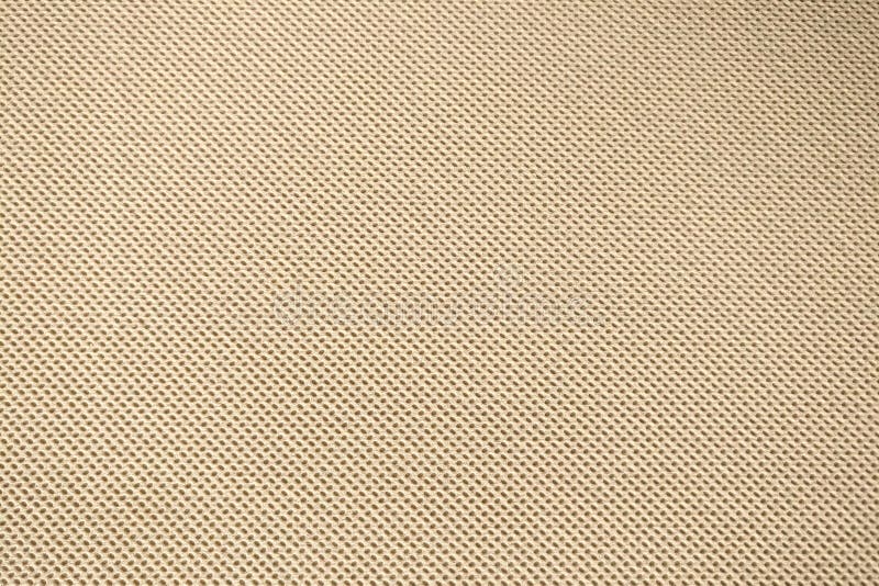 The Background is Yellow Fabric with a Repeated Uniform Pattern of Dots ...