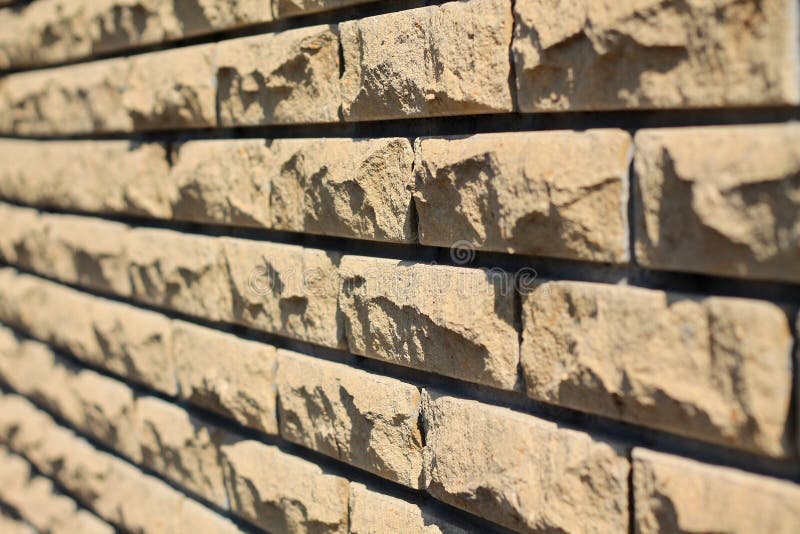 Background of Yellow Facing Bricks. Side View Close Up. Stock Photo ...