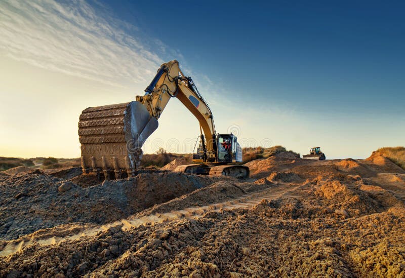 Backhoe in Action on a Construction Site Close Up Stock Photo - Image ...