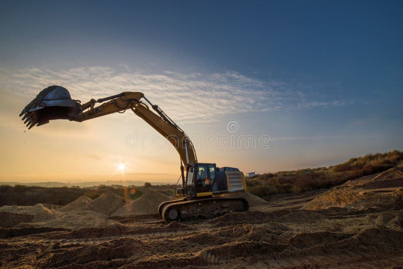 Backhoe in Action on a Construction Site Close Up Stock Photo - Image ...