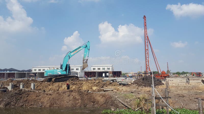 Backhoe is Building a Building Base. Editorial Photography - Image of ...