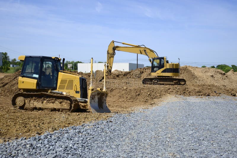 Backhoe and bulldozer stock image. Image of large, machinery - 38162203