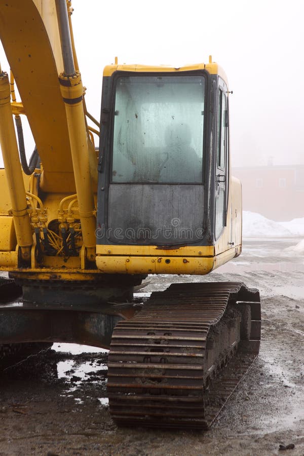 Backhoe Cabin on Wet and Foggy Day Stock Photo - Image of hydraulics ...