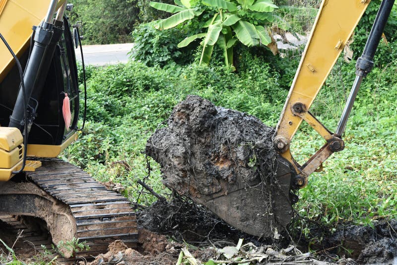 Backhoe dig ground stock image. Image of environment - 135523893