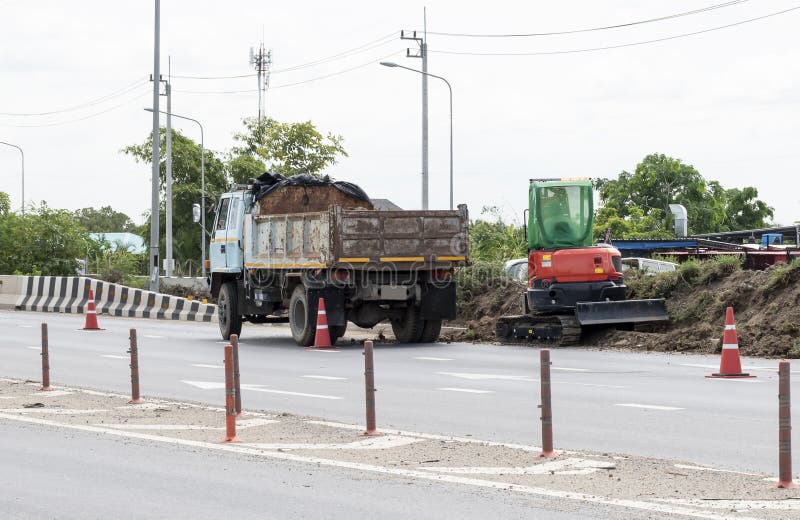 Backhoe is Digging Soil on Road Stock Photo - Image of transportation ...