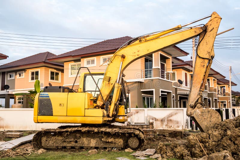 Backhoe Excavator at House Construction Site Stock Photo - Image of ...