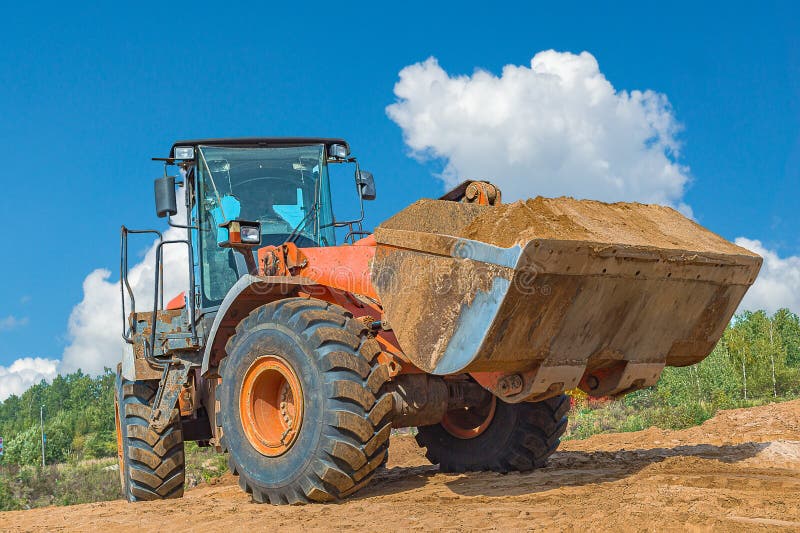 Backhoe Loader or Bulldozer - Excavator with Clipping Path on a ...