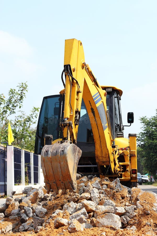 Front Loader Dumping Debris on Construction Site Stock Image - Image of ...