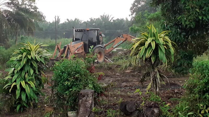 Backhoe loader doing work stock footage. Video of work - 158932816