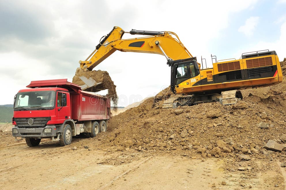Backhoe Loader Loading Truck Stock Image - Image of track, earthmover ...