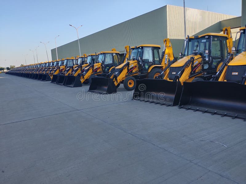Backhoe Loaders Stand in a Line. Stock Image - Image of stand, items ...