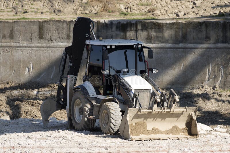 A Backhoe Machine is Working in Construction Stock Photo - Image of ...