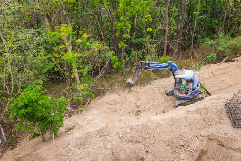 Backhoe Tractor Works on a Construction Site Stock Photo - Image of ...