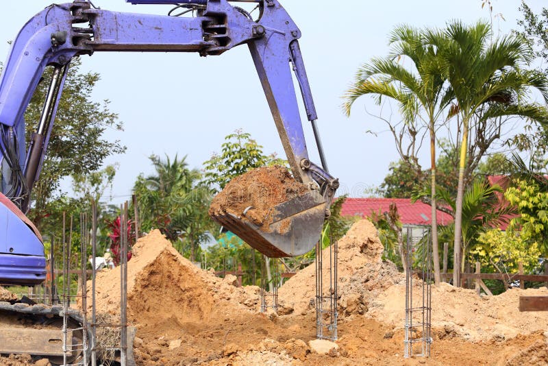 Backhoe Tractor Works on a Construction Site Stock Photo - Image of ...