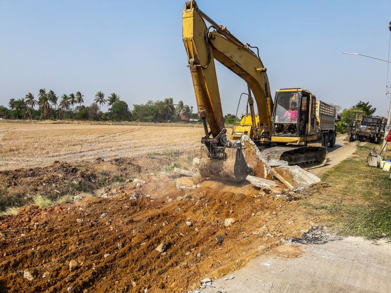 Excavator and backhoe editorial stock image. Image of soil - 54901439