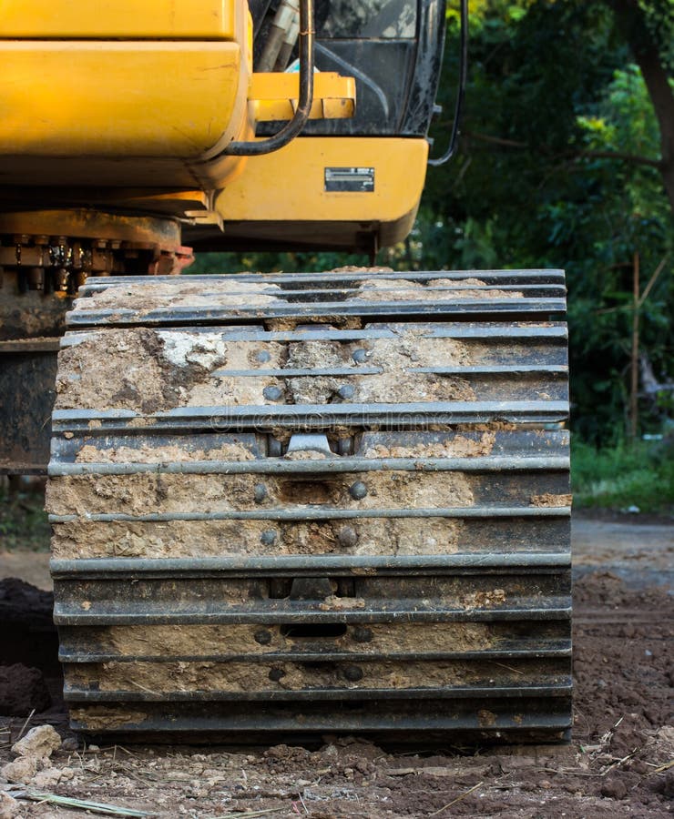 Backhoe Wheel Located on Site Stock Image - Image of track ...