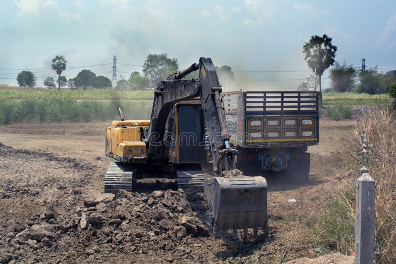 Backhoe Working at Construction Area Stock Photo - Image of truck ...
