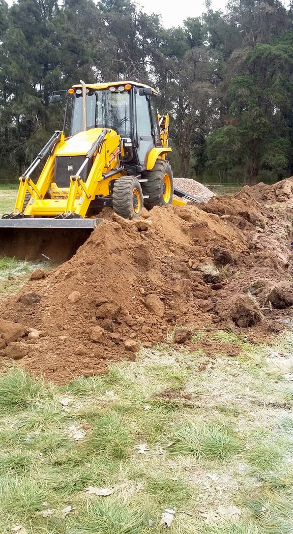 Backhoe Working on Trench Construction Stock Photo - Image of earth ...