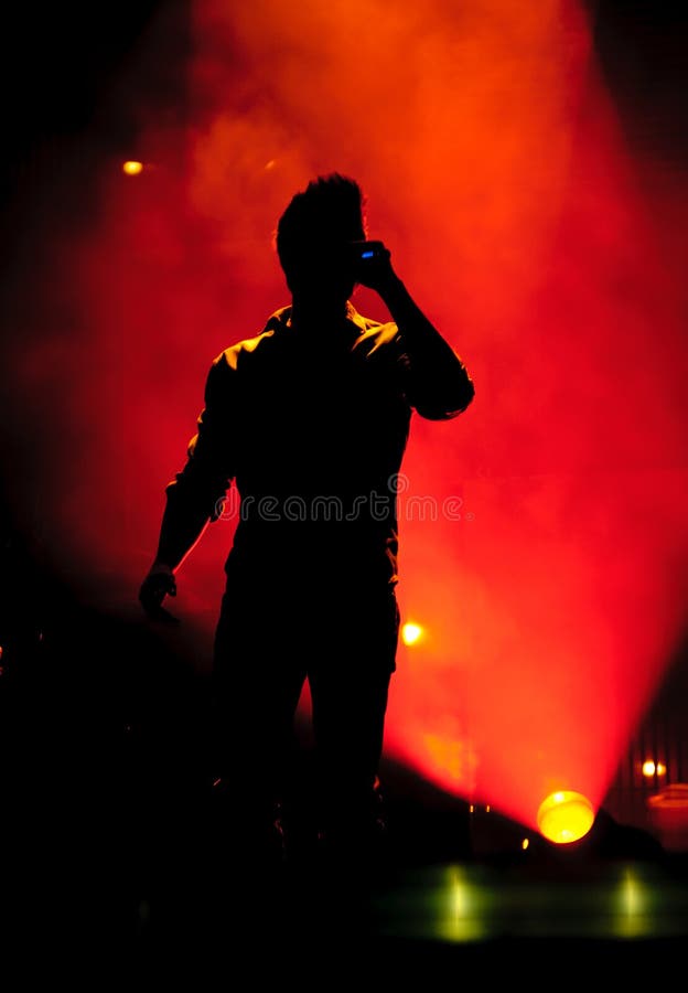 Backlight Singer during Concert Stock Image - Image of hearing, live ...