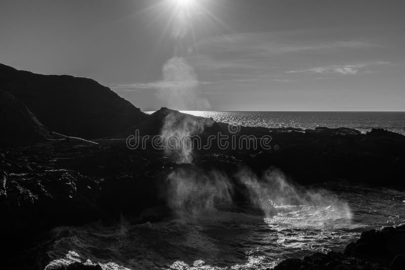 Backlight of the Water Expelled by a Hole in the Rock when the Waves ...