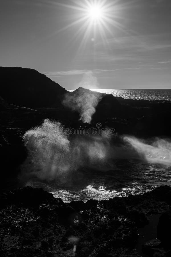 Backlight of the Water Expelled by a Hole in the Rock when the Waves ...