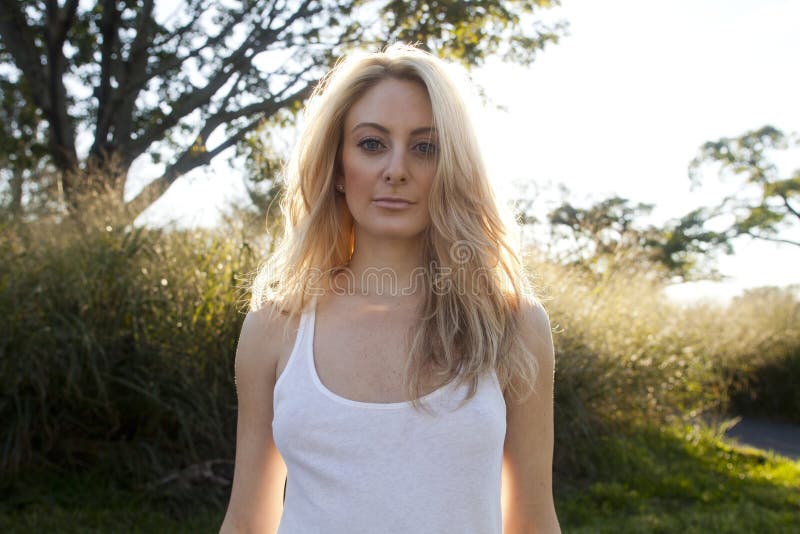 Backlit Blond in Sun Dress stock image. Image of beauty - 21578061