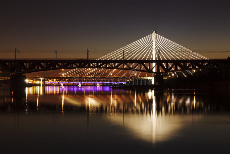 Backlit bridge at night stock photo. Image of cityscape - 33437424