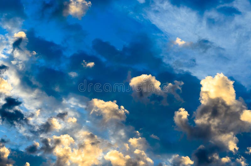 Backlit Clouds in a Blue Sky Stock Photo - Image of afternoon ...