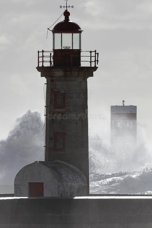 Backlit Lighthouse during Storm Stock Photo - Image of heavy, ocean ...