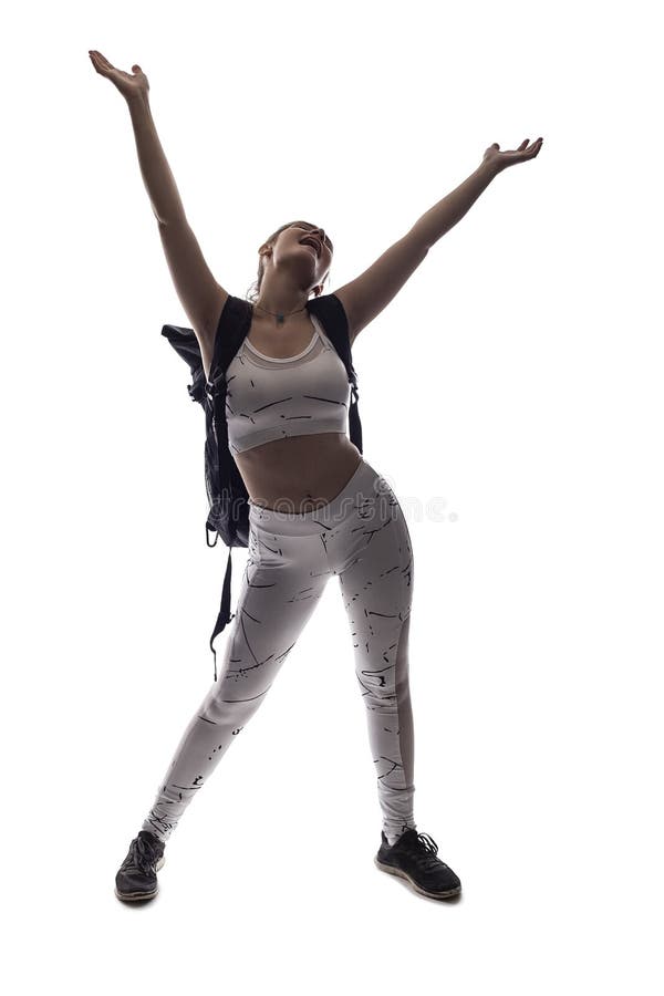 Backlit Model Posing As a Hiker or Backpacker on a White Background for ...