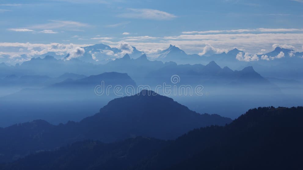 Backlit mountain ranges stock image. Image of panorama - 44769893
