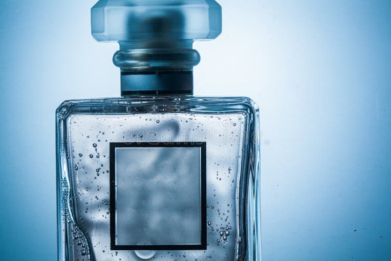 Backlit Perfume Bottle Shot in Studio Stock Image - Image of cold ...
