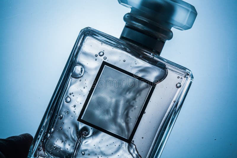 Backlit Perfume Bottle Shot in Studio Stock Image - Image of female ...