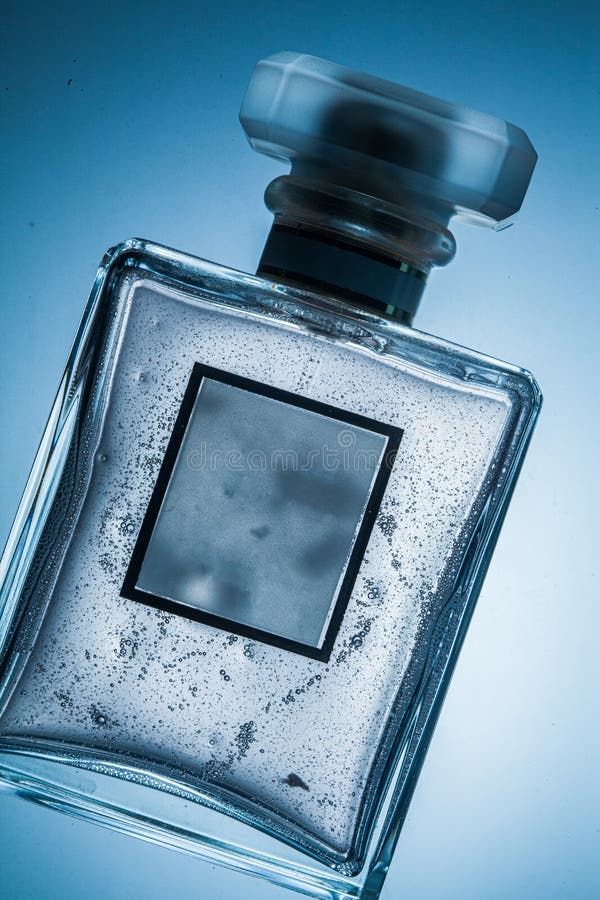 Backlit Perfume Bottle Shot in Studio Stock Photo - Image of female ...