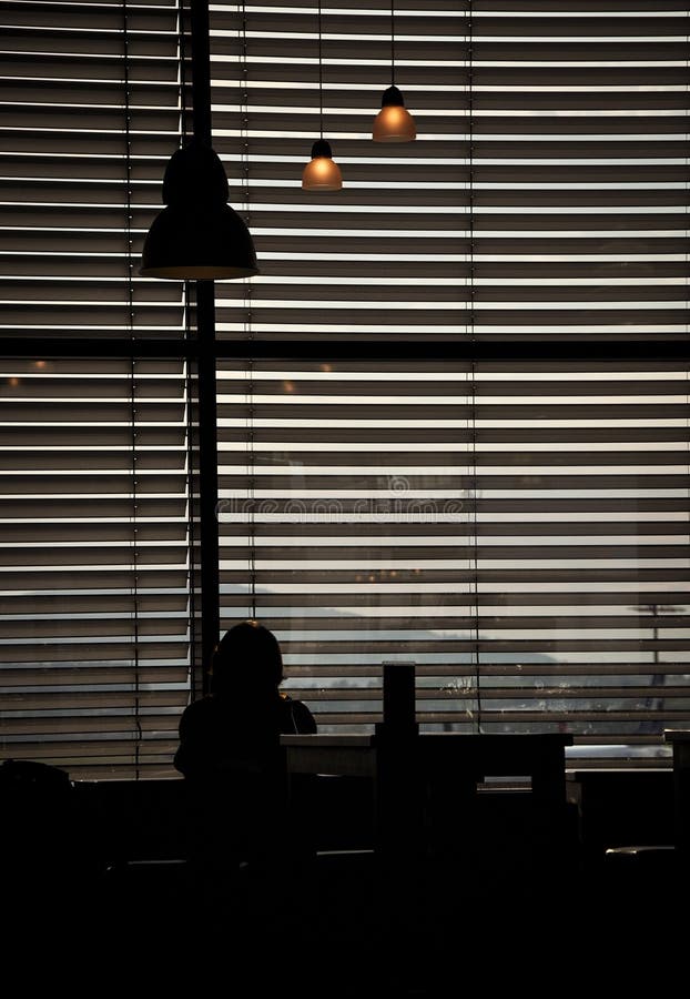 Backlit Person in Front of a Airport Cafe Window Stock Photo - Image of ...