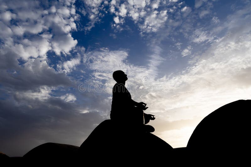 Backlit Shot of Isolated Man Meditating at Wall with Sunset Dramatic ...