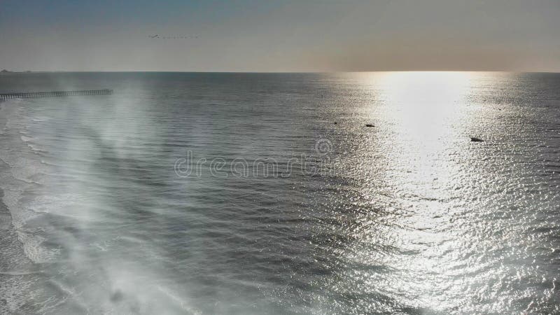 Backlit View of Ocean at Sunset from Drone Stock Image - Image of beach ...