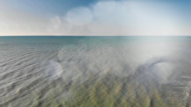 Backlit View of Ocean at Sunset from Drone Stock Photo - Image of ...