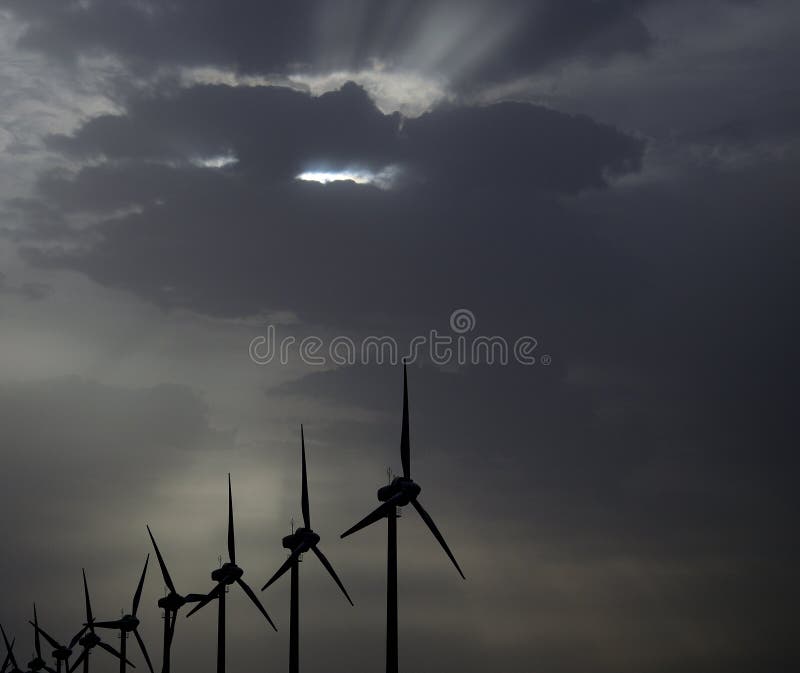 Wind Turbines at Dawn with Sun Rays Stock Photo - Image of landscape ...