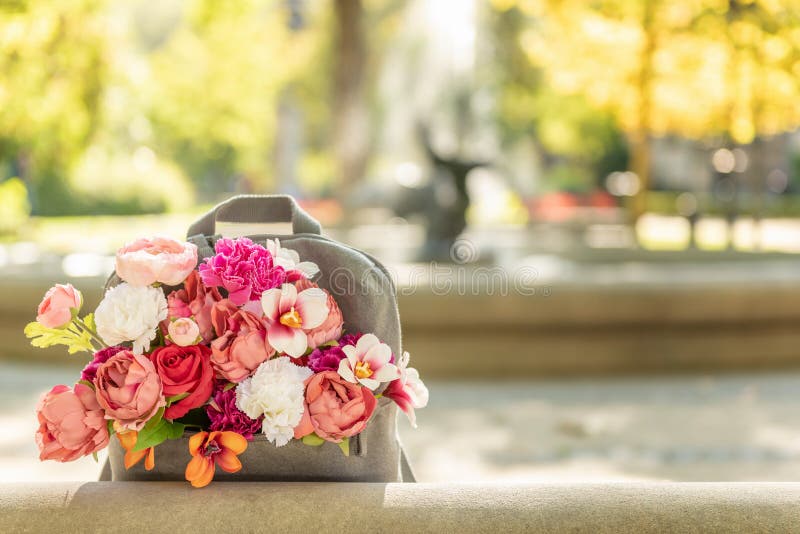Backpack with Different Flowers. Spring Summer Concept Stock Image ...