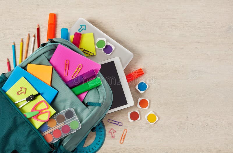 Backpack Full with School Supplies Stock Photo - Image of paper ...